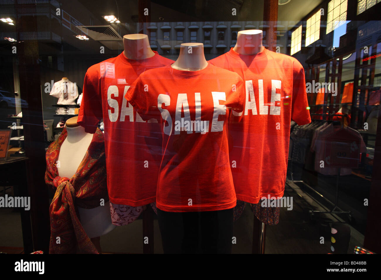 SALE SIGNS IN SHOP FRONT WINDOWS Stock Photo - Alamy