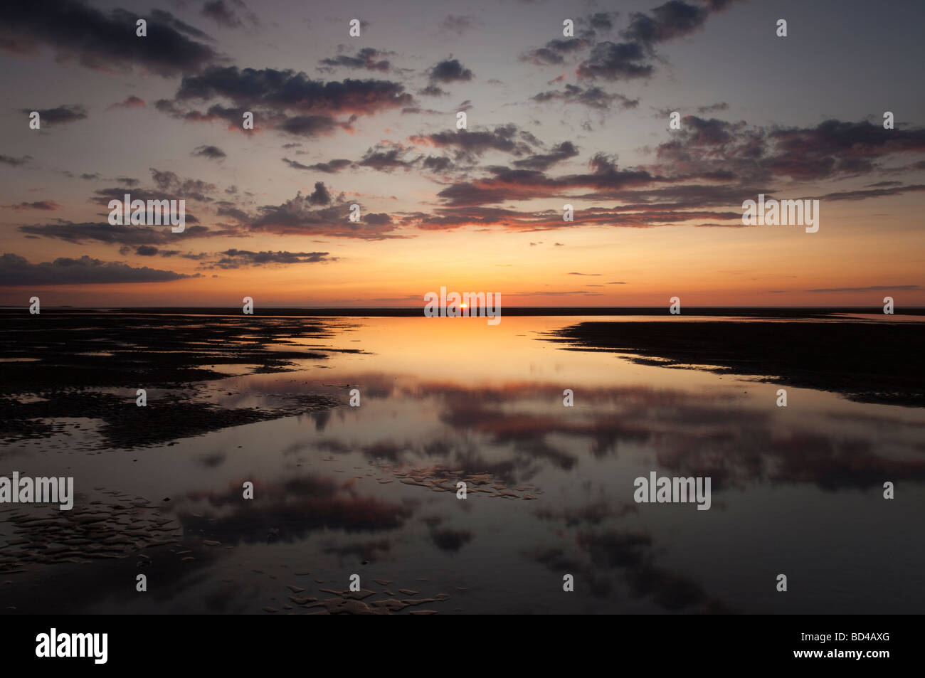 Red sunset with sun low on horizon hi-res stock photography and images ...