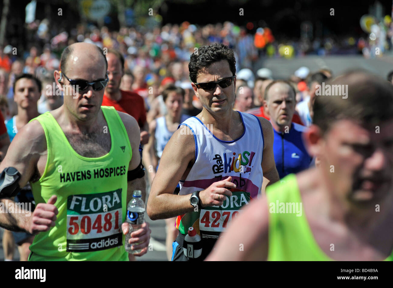 men running together in london marathon Stock Photo - Alamy