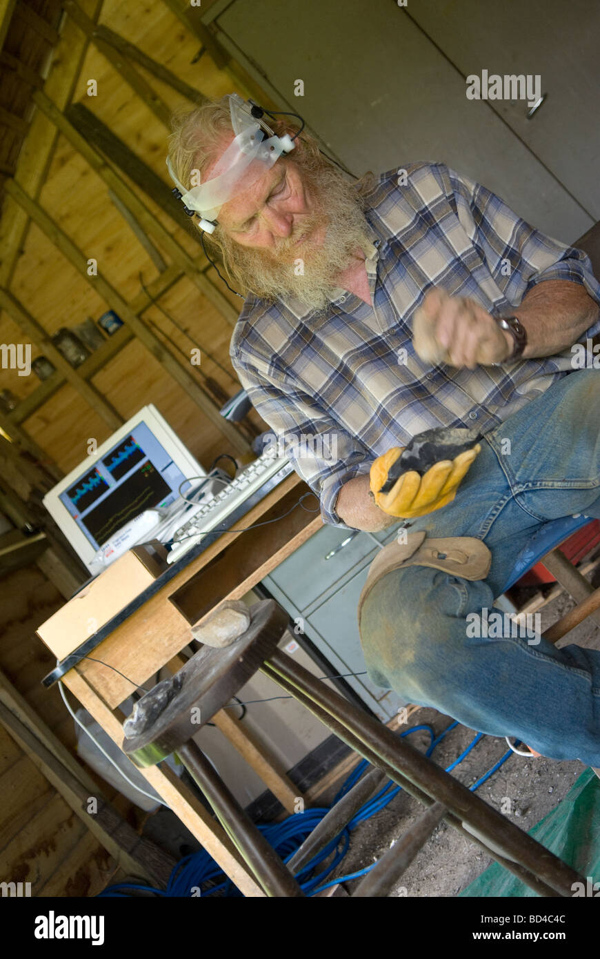 Flint knapper fitted with ultra sound device taking part in a neuro ...