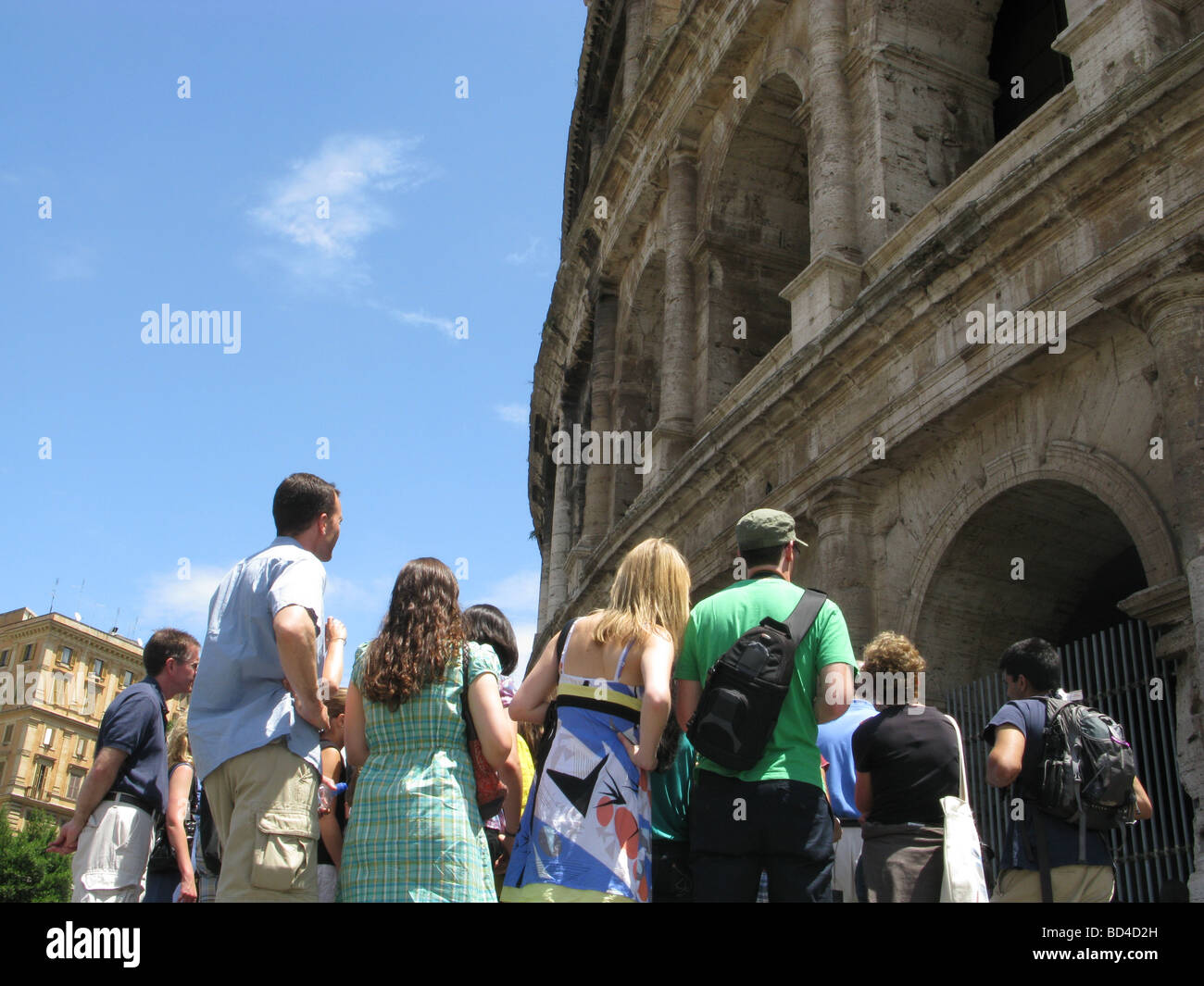 group of young tourists at the colosseum amphitheatre ruins, rome Stock ...