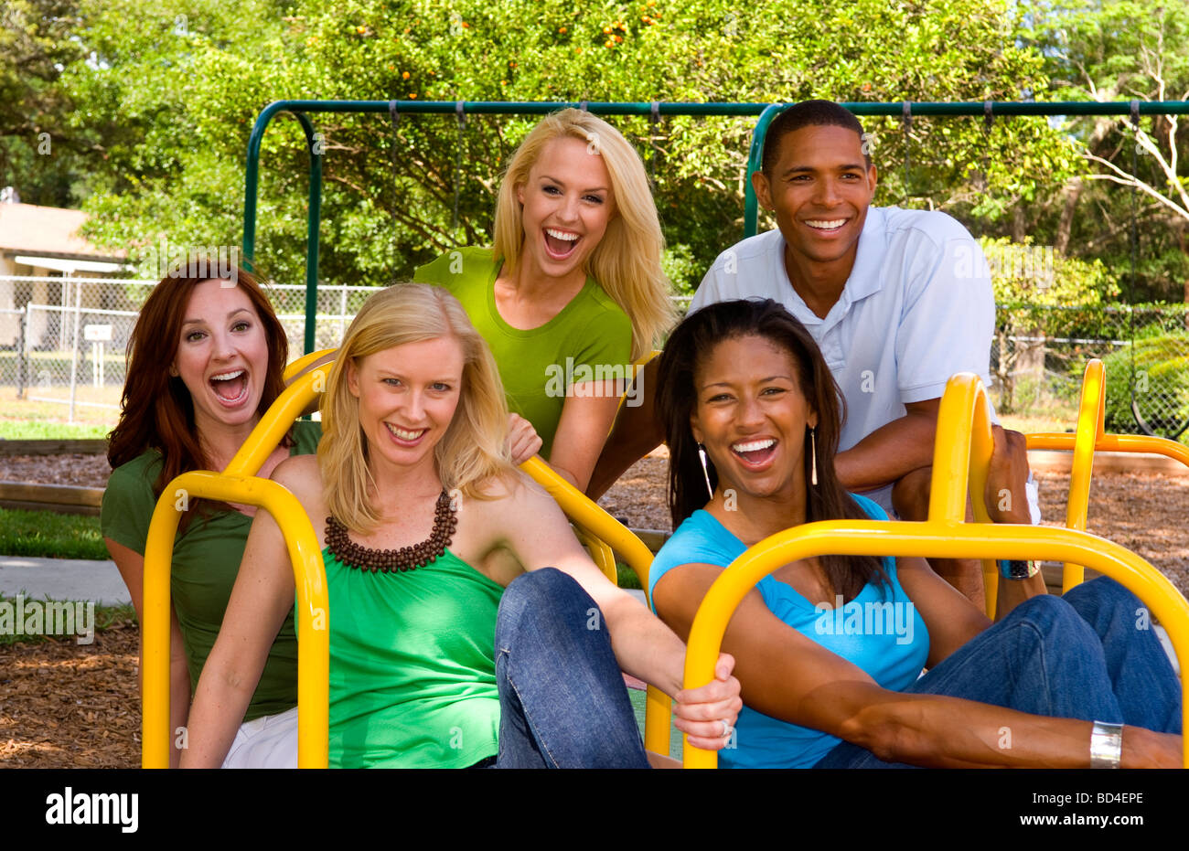 Great group of mixed ethnic friends having fun andf laughing at ...