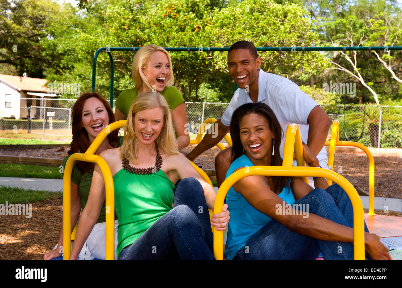 Great group of mixed ethnic friends having fun andf laughing at ...