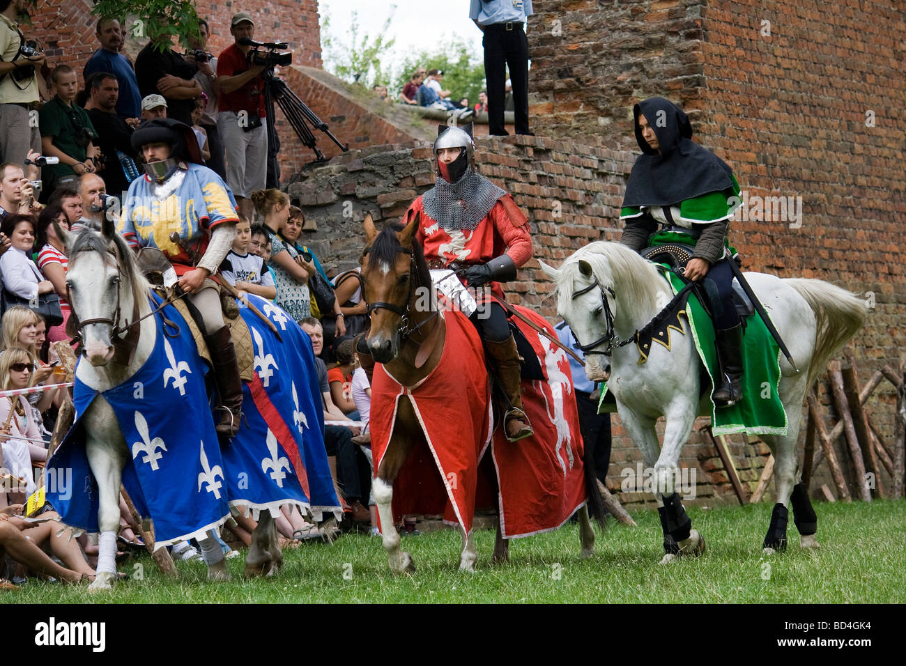 Medieval cavalry knights on military horses presenting themselves to ...