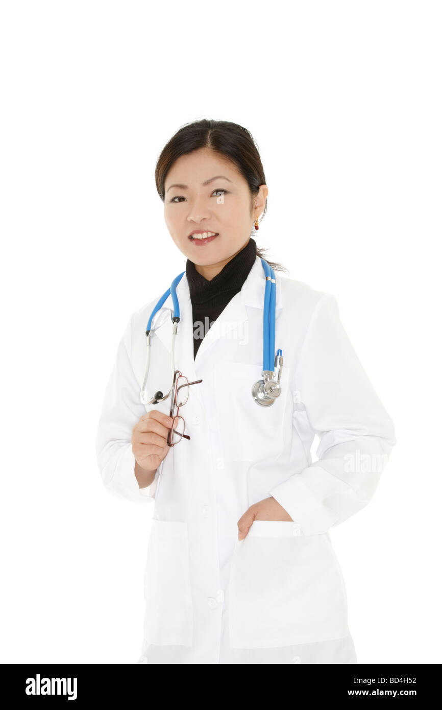 Beautiful Asian doctor or nurse on a white background Stock Photo - Alamy