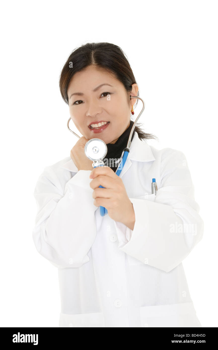 Beautiful Asian doctor or nurse on a white background Stock Photo - Alamy