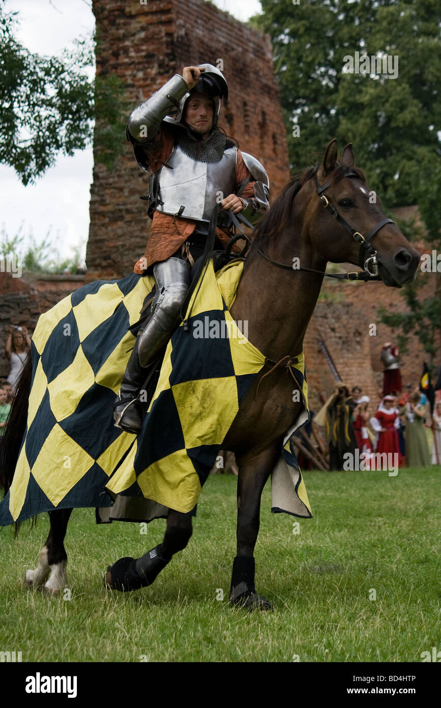 Proud medieval cavalry knight on military horse. Taken in Malbork ...