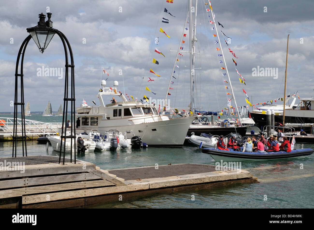 Cowes regatta week visiting sailors yachtsmen on the RYS landing stage ...