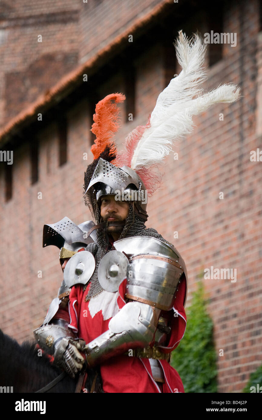 Proud medieval cavalry knights on military horses. Taken in Malbork ...
