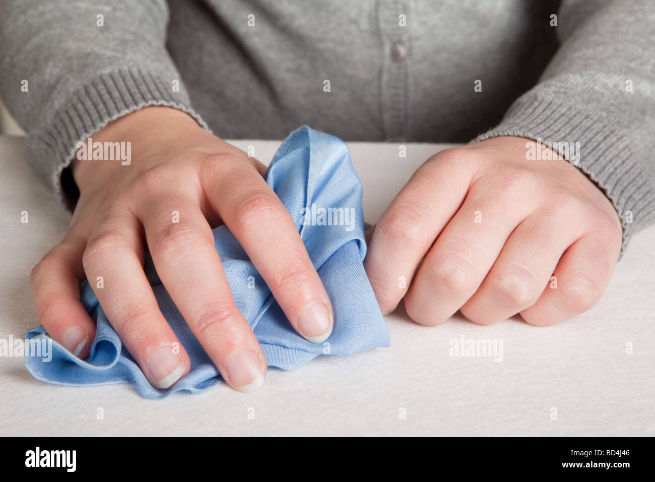 Hands of a mourning woman holding a handkerchief Stock Photo - Alamy
