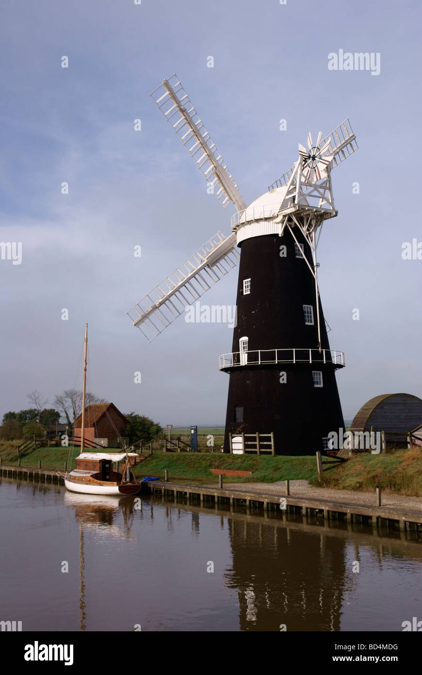 Berney Arms Windpump with traditional Norfolk Broads sailing boat Stock ...