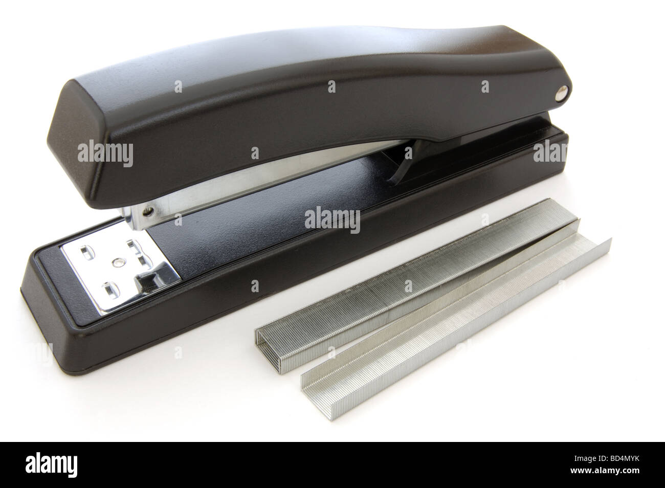 Black paper stapler and staple refills isolated on white background ...