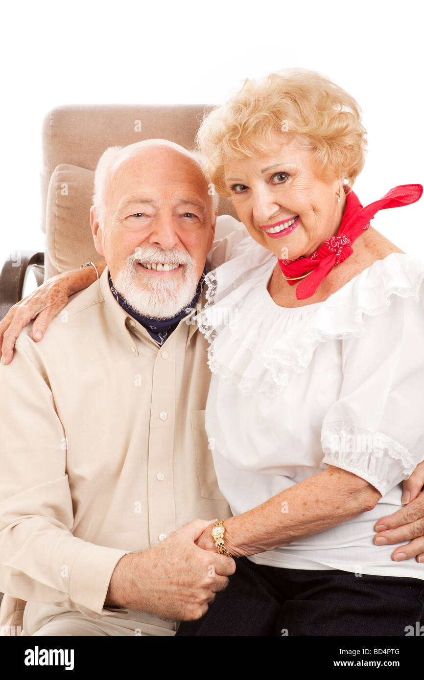 Adorable country western senior couple cuddling up together Stock Photo ...