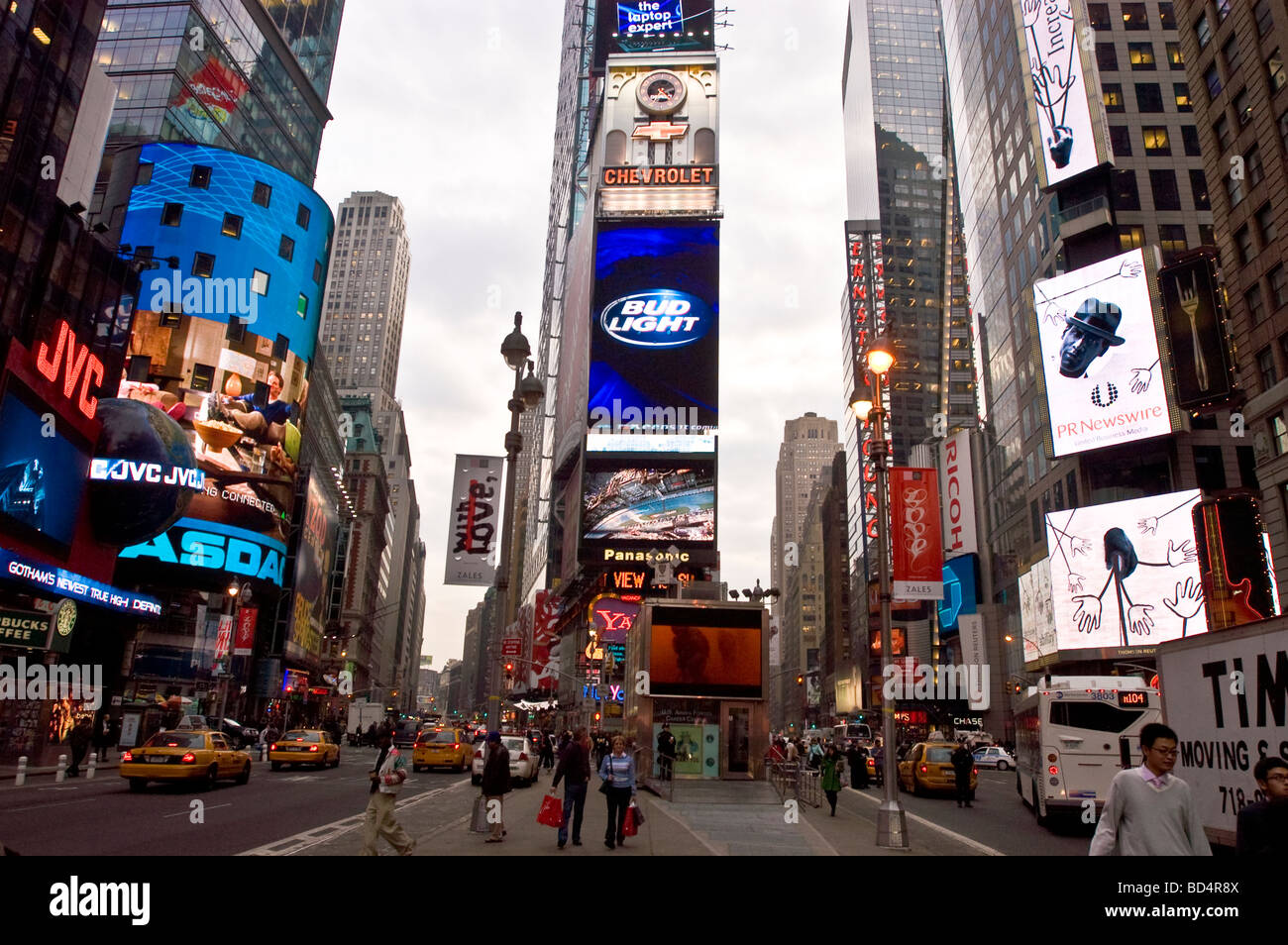 Times Square at dusk with light advertisements, Manhattan, New York ...