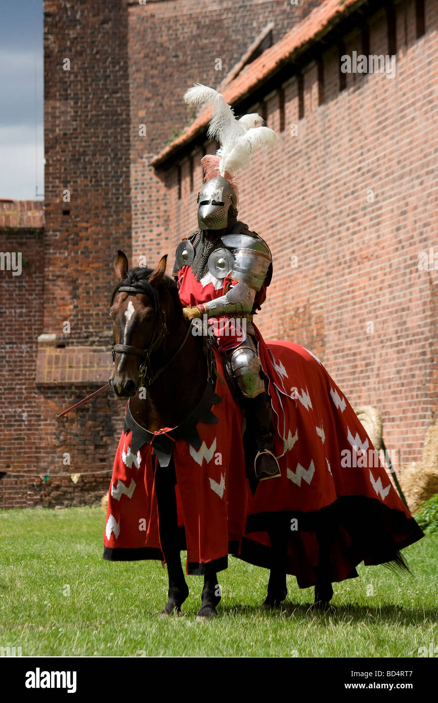 Proud medieval cavalry knight on military horse. Taken in Malbork ...