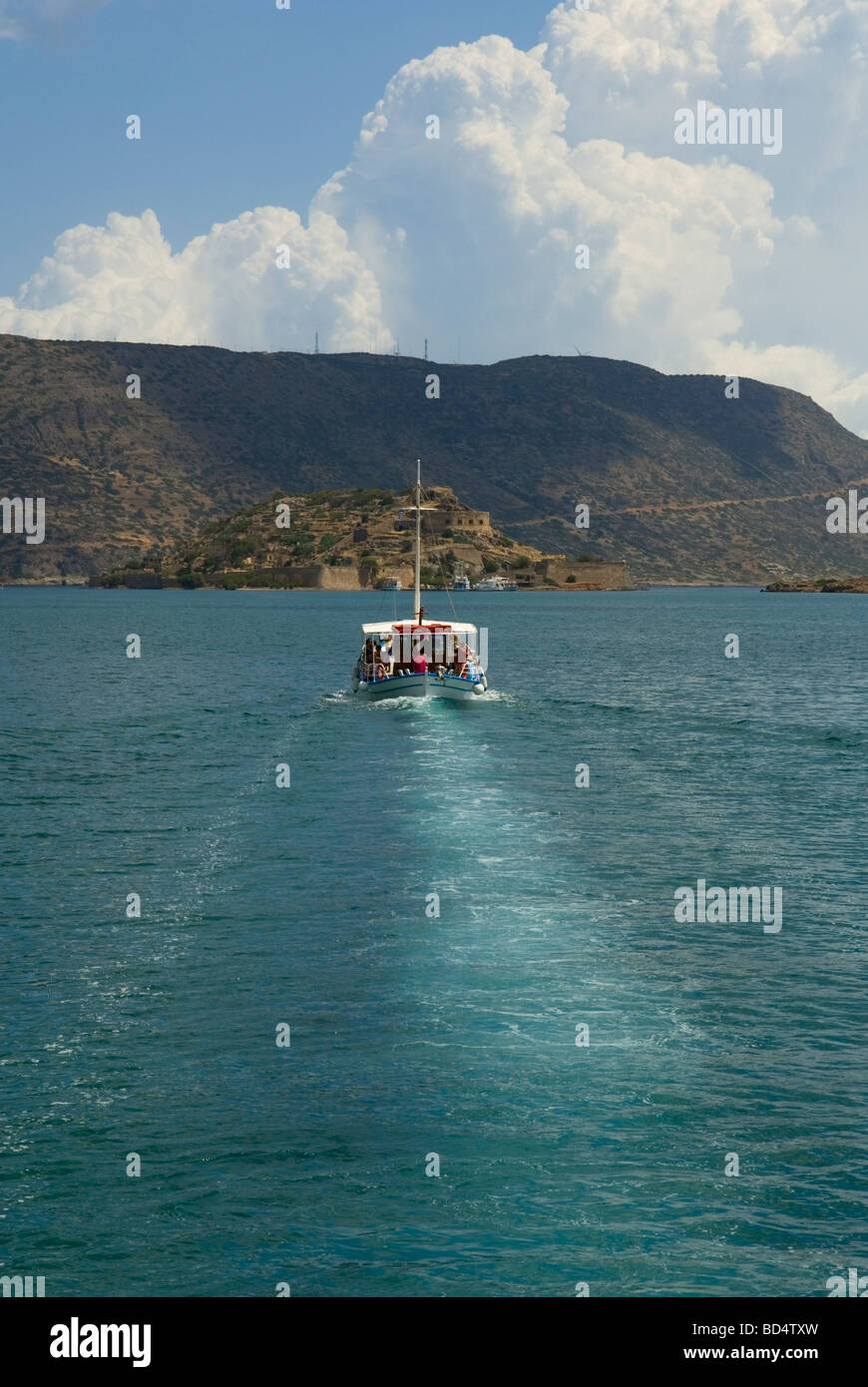 Passengers on Boat from Elounda approaching Spinalonga Crete Stock ...