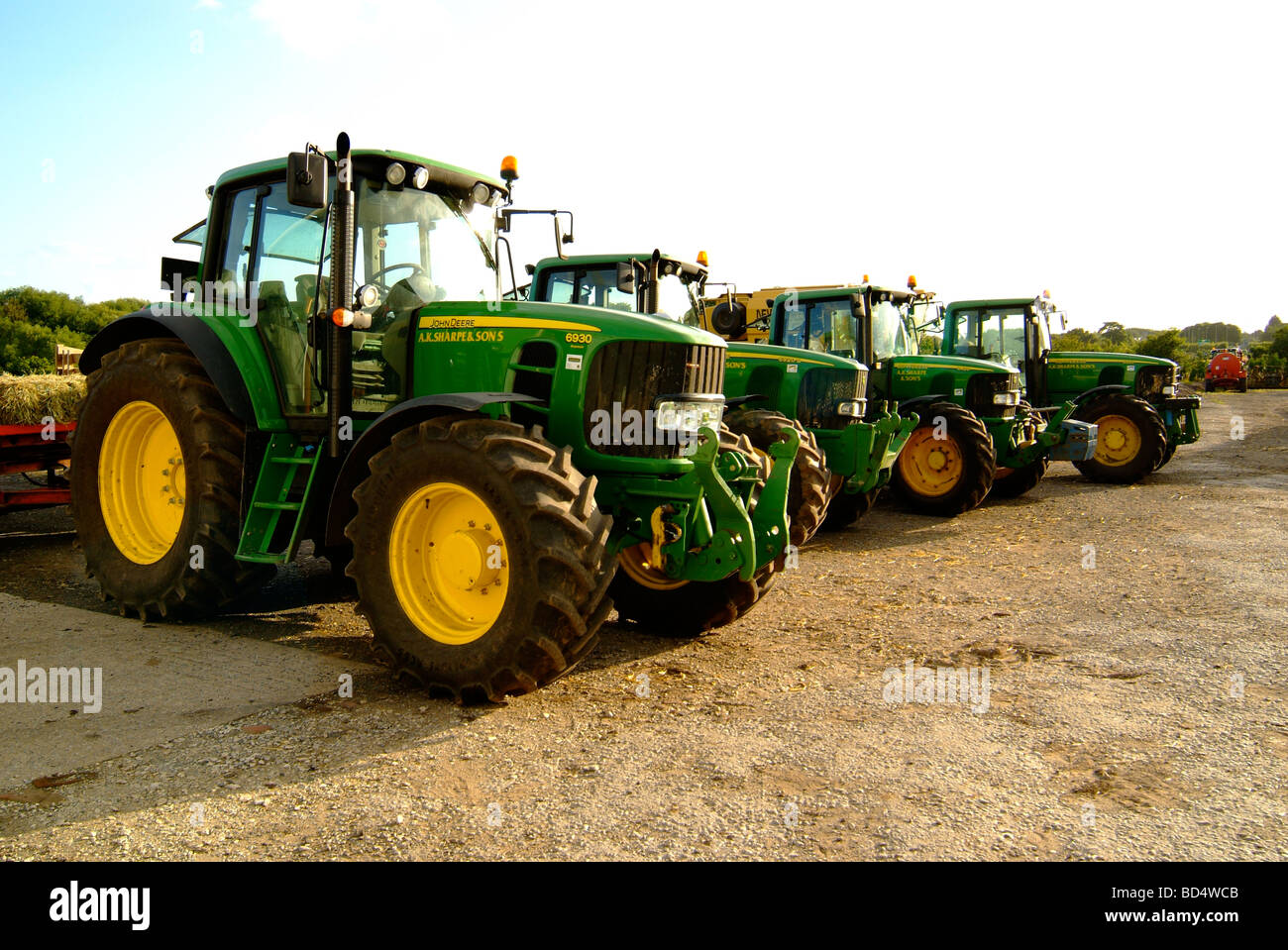 farm tractors in a row Stock Photo - Alamy