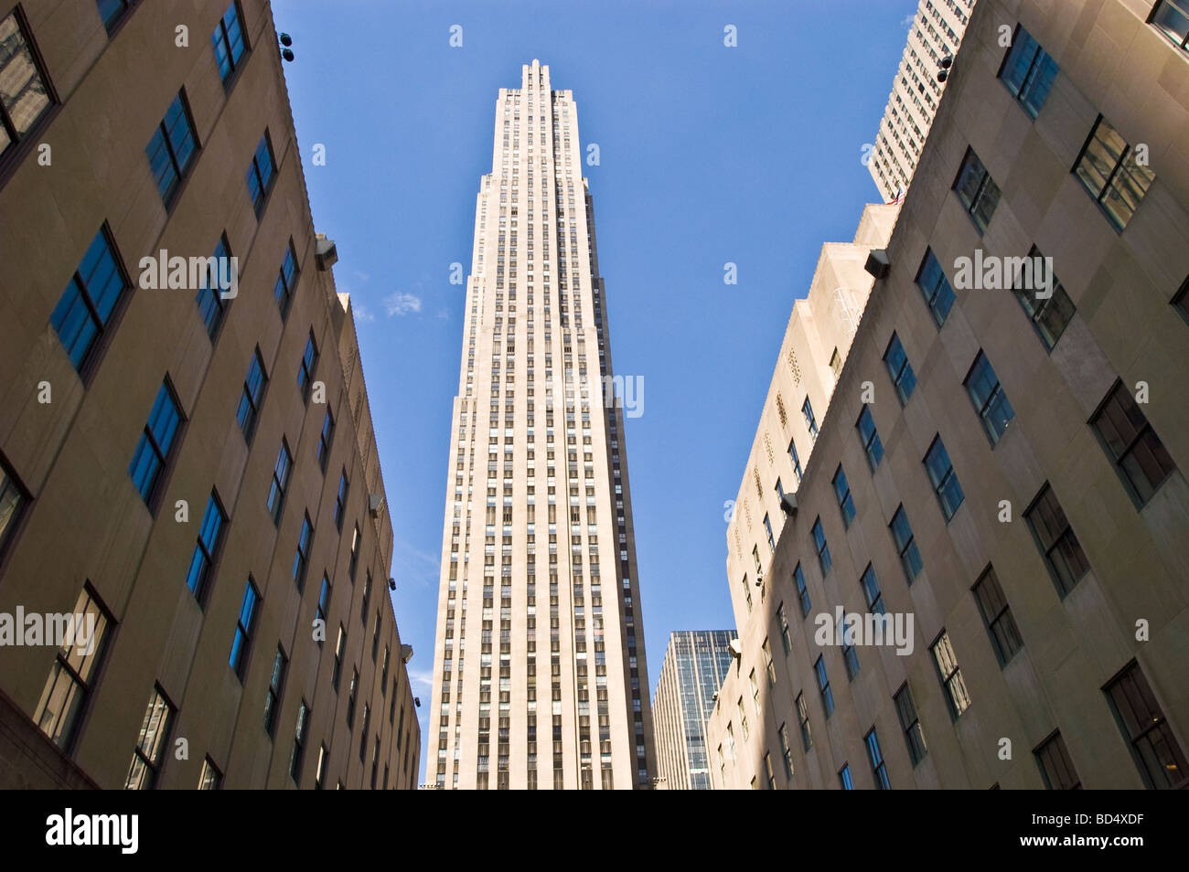 Rockefeller Center skyscraper, blue sky background Manhattan, New York ...