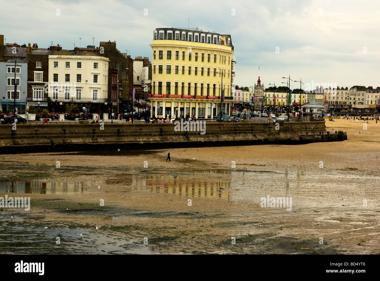 Reflections of art deco buildings on the beach at Margate in Kent Stock ...