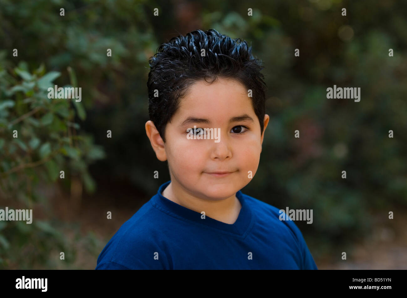 Cute little boy in the woods Stock Photo - Alamy