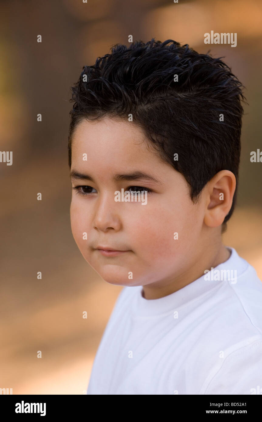 Pensive little boy outdoors Stock Photo - Alamy