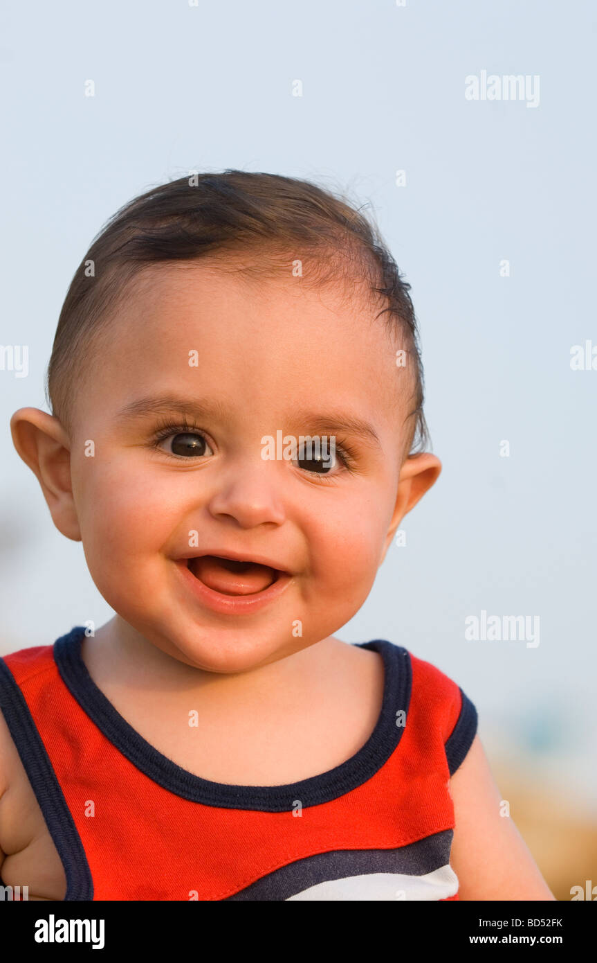 Little happy baby outdoors Stock Photo - Alamy