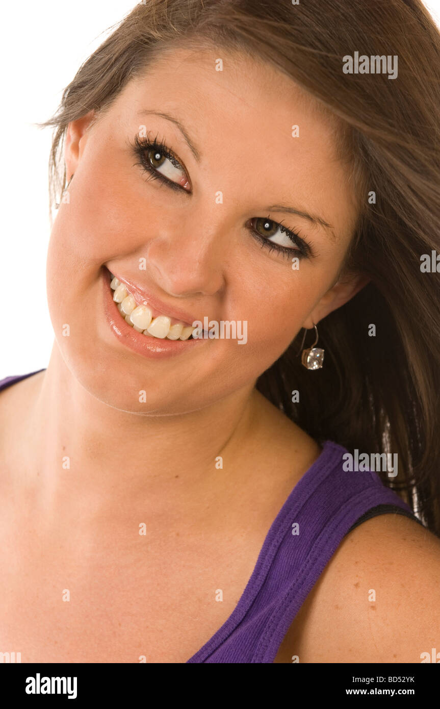 Young woman smiling looking up isolated on white Stock Photo - Alamy