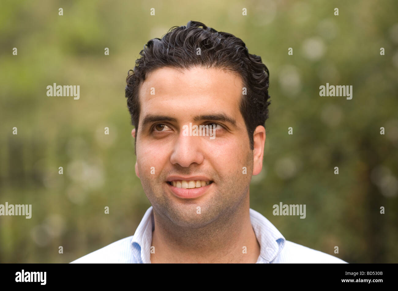 Handsome ethnic man smiling outdoors Lebanon Middle East Stock Photo ...