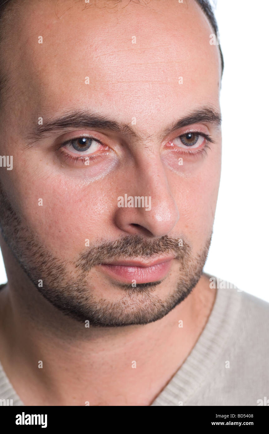 Close up of a pensive man Stock Photo - Alamy
