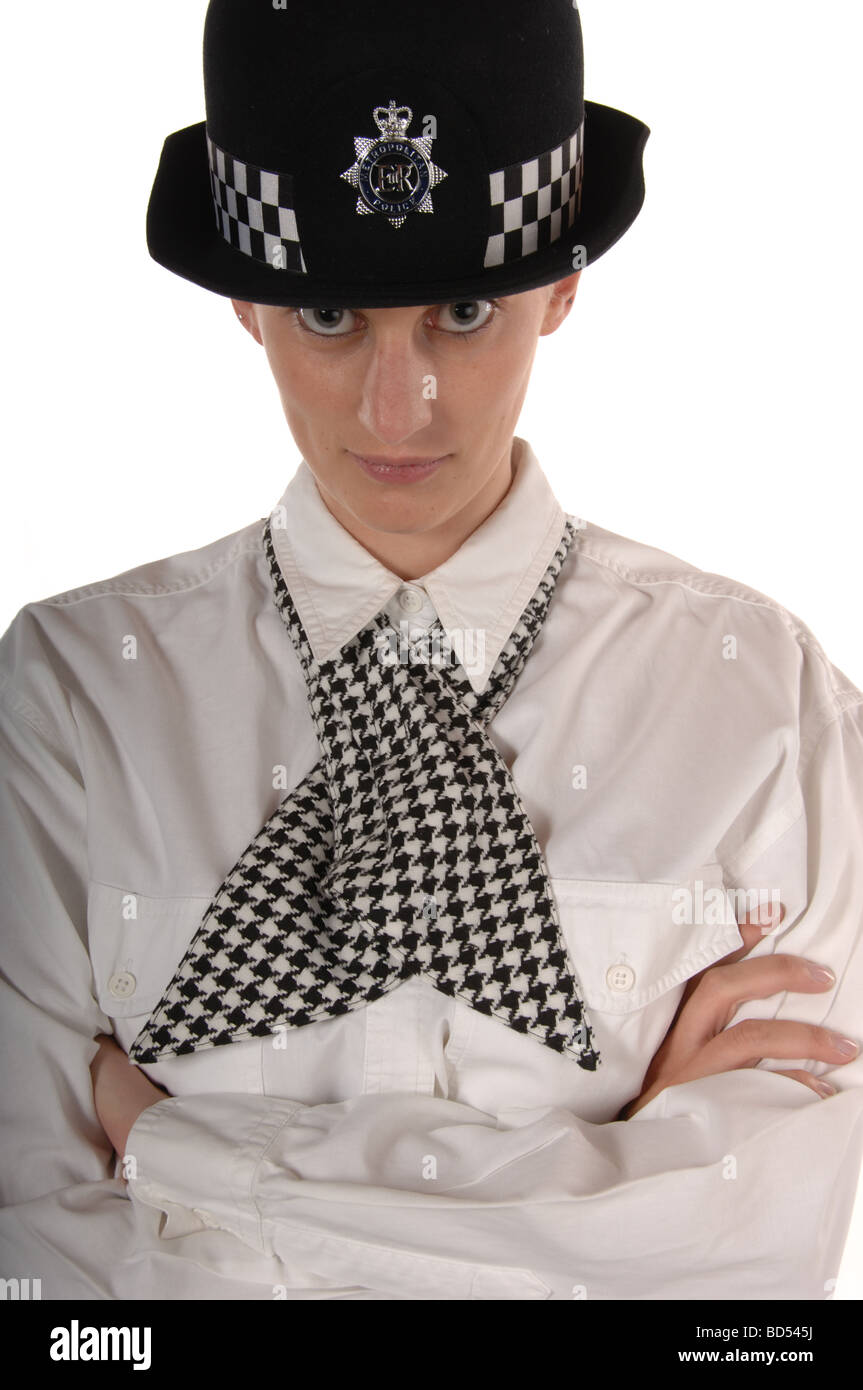 Uniformed UK female police officer with giving harsh look isolated on ...