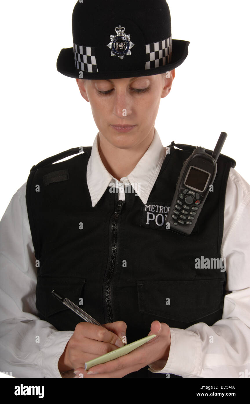 UK police woman writing in her note book Stock Photo - Alamy