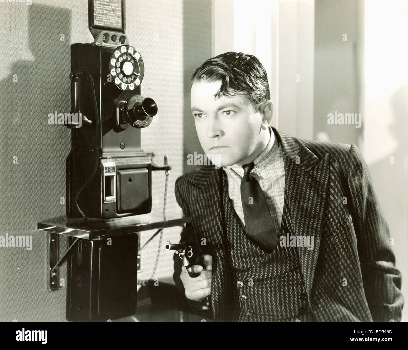 Gangster at the Pay Phone Stock Photo - Alamy