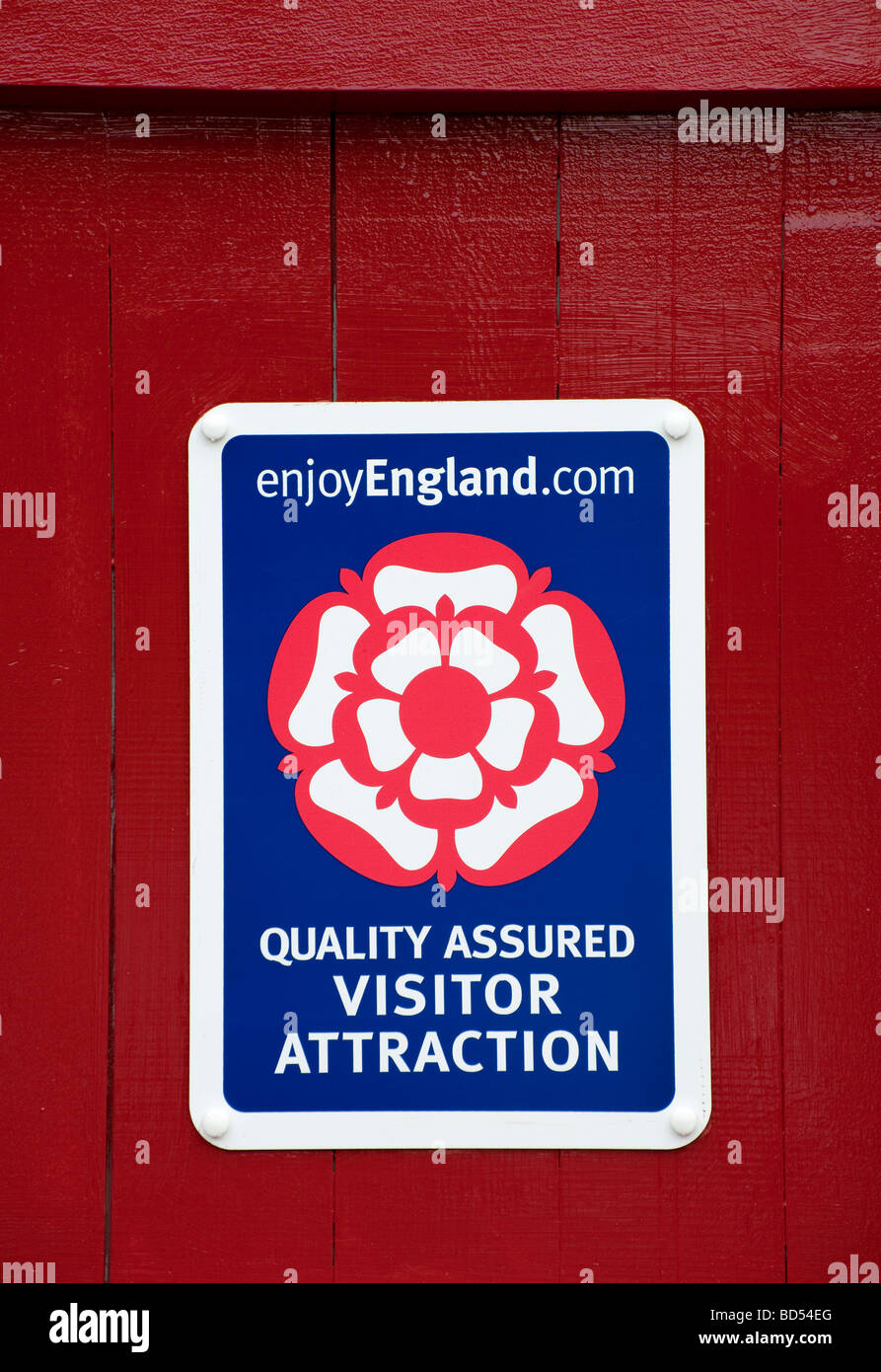 enjoyEngland com tourism sign on red door Stock Photo - Alamy