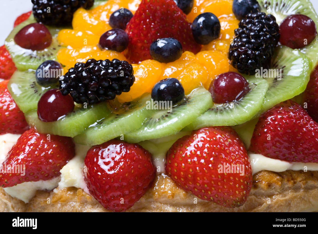 Assorted fruit covering creme filling and pastry Stock Photo - Alamy