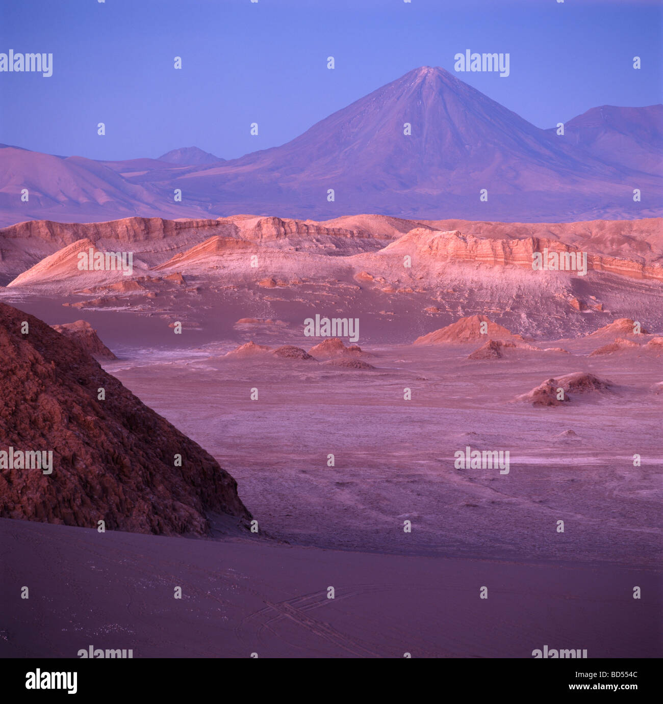 Lincanabur volcano desert formations at dusk southeast of Calama Valley ...