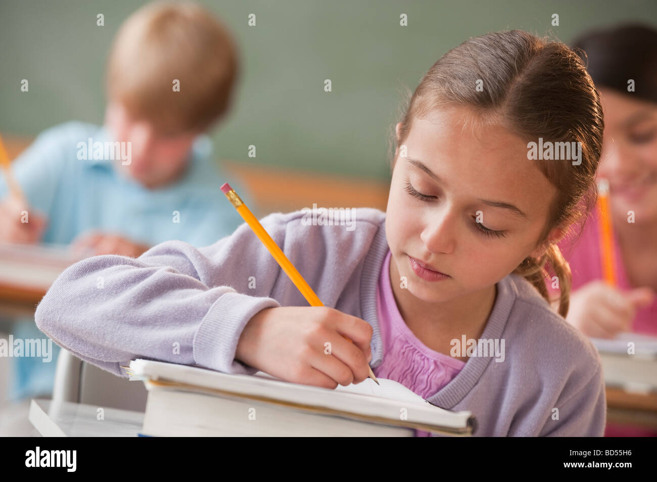 Students in a classroom Stock Photo - Alamy