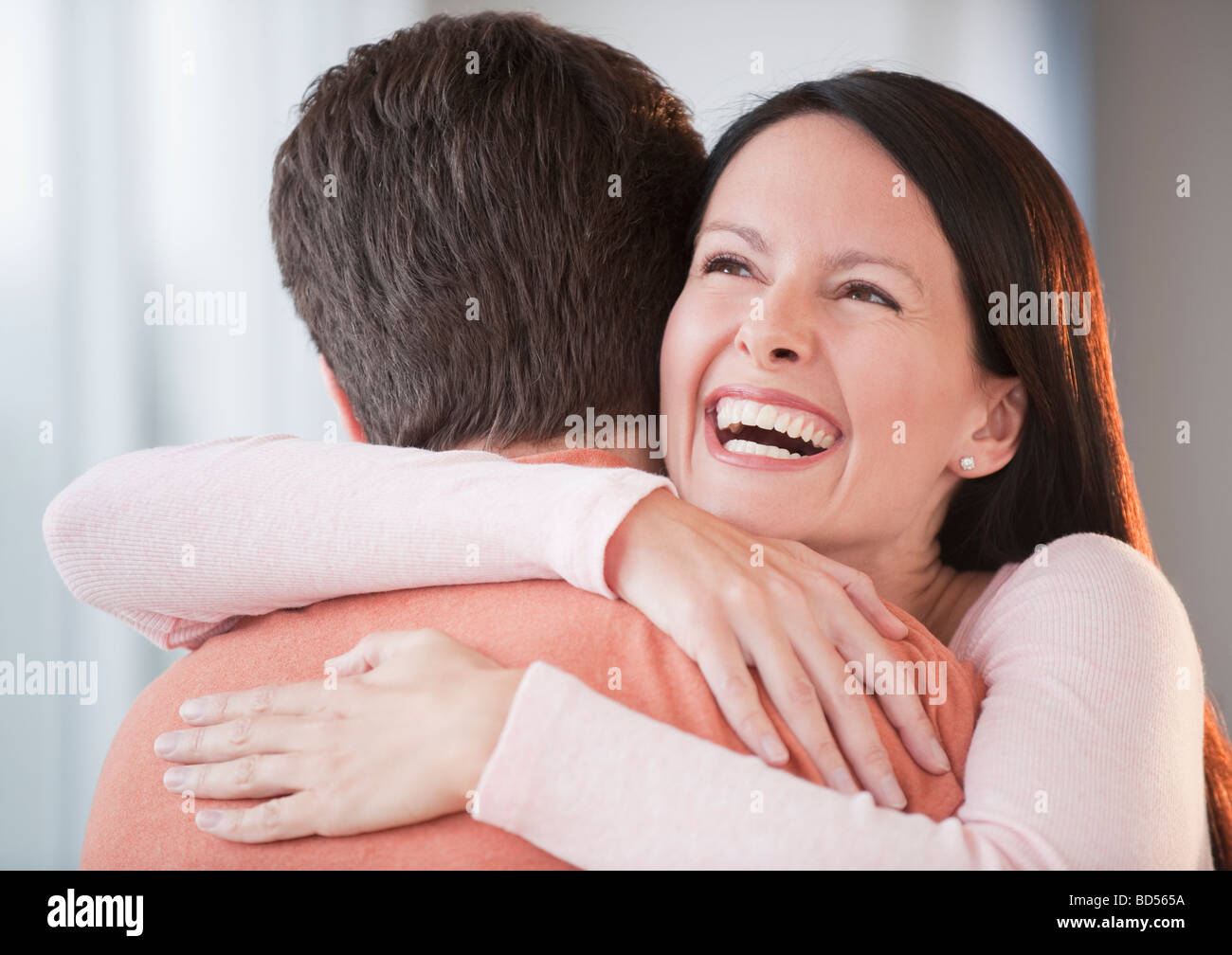 A couple hugging Stock Photo - Alamy