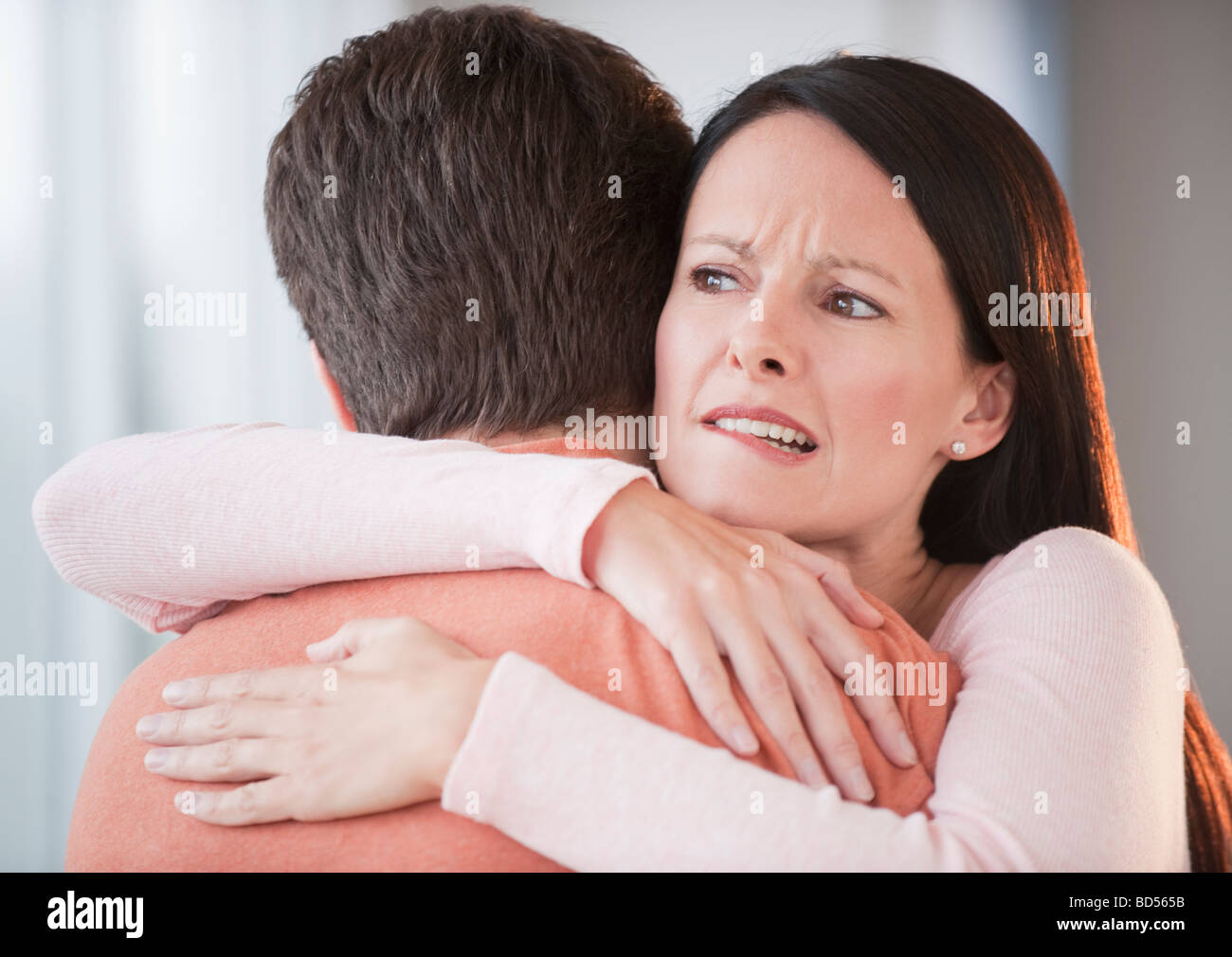 A couple hugging Stock Photo - Alamy
