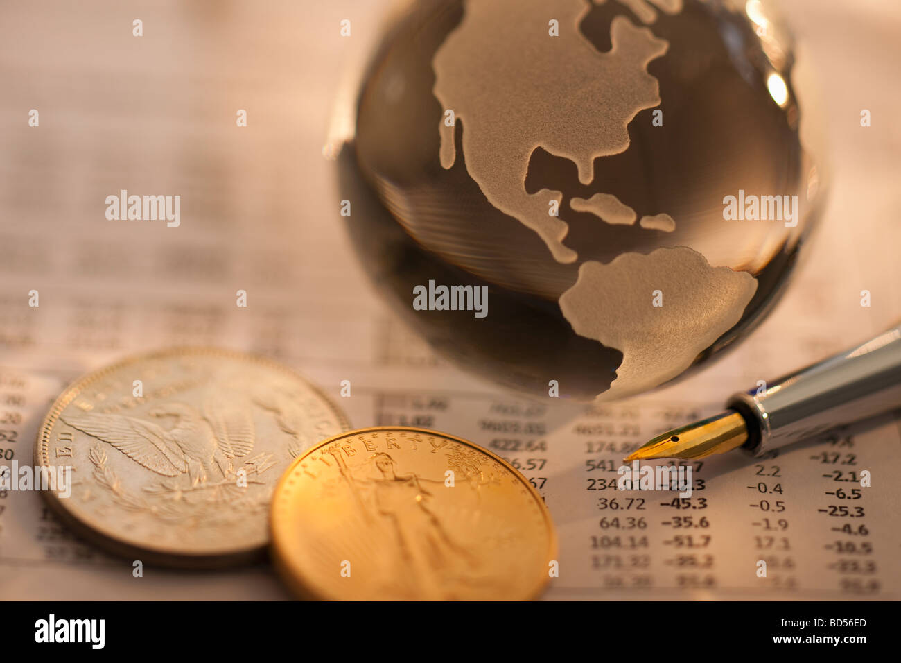 Map world globe coins hi-res stock photography and images - Alamy