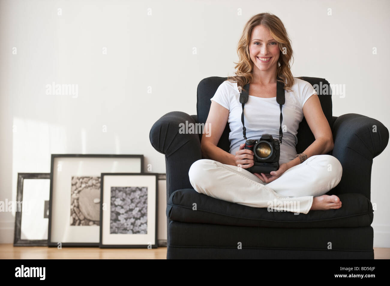 A woman with a camera Stock Photo - Alamy