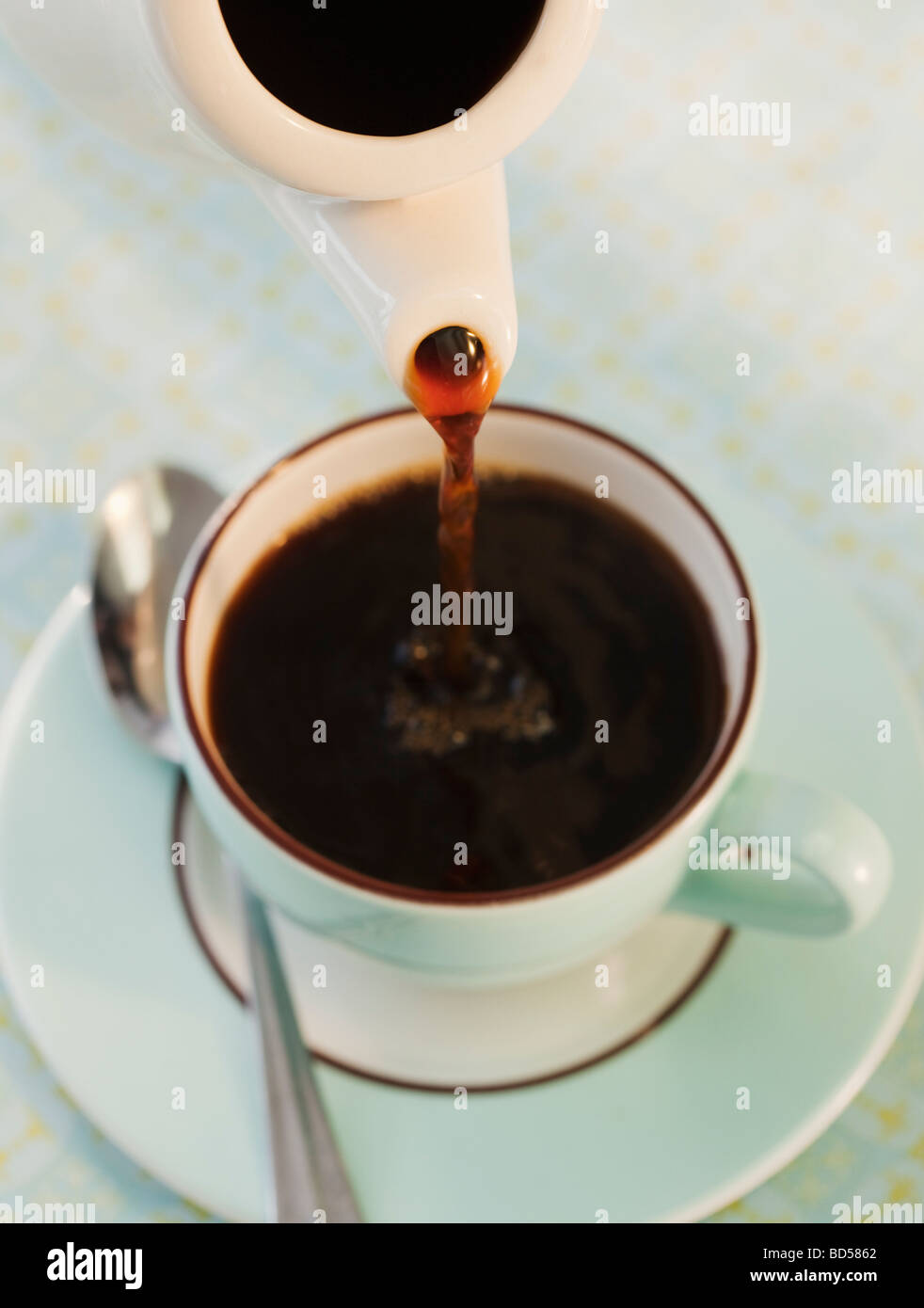 Coffee being poured Stock Photo - Alamy