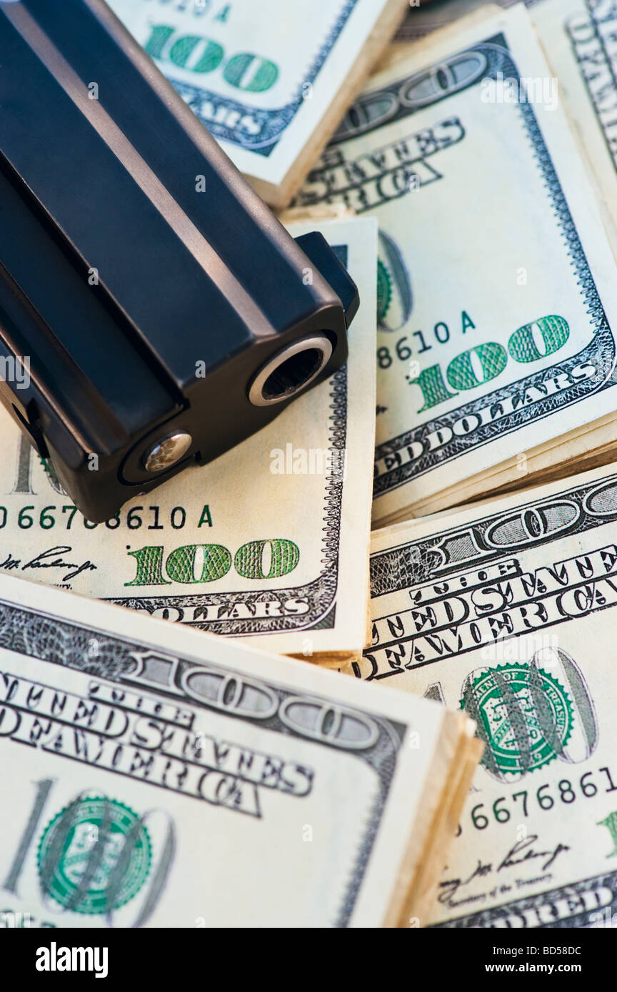 Gun and money hi-res stock photography and images - Alamy
