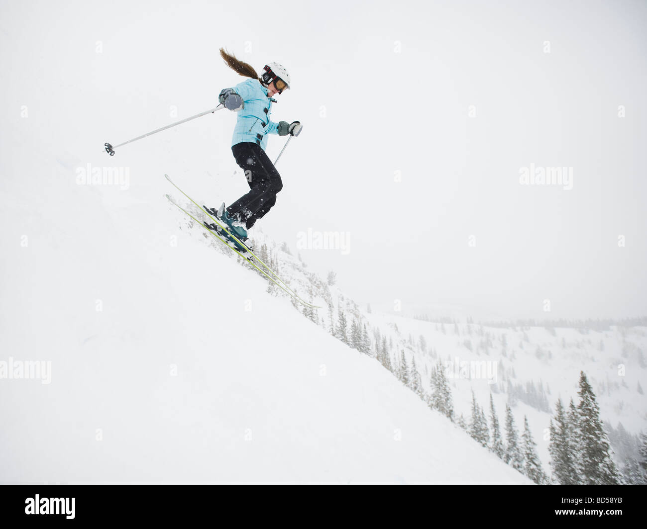 A downhill skier jumping Stock Photo - Alamy