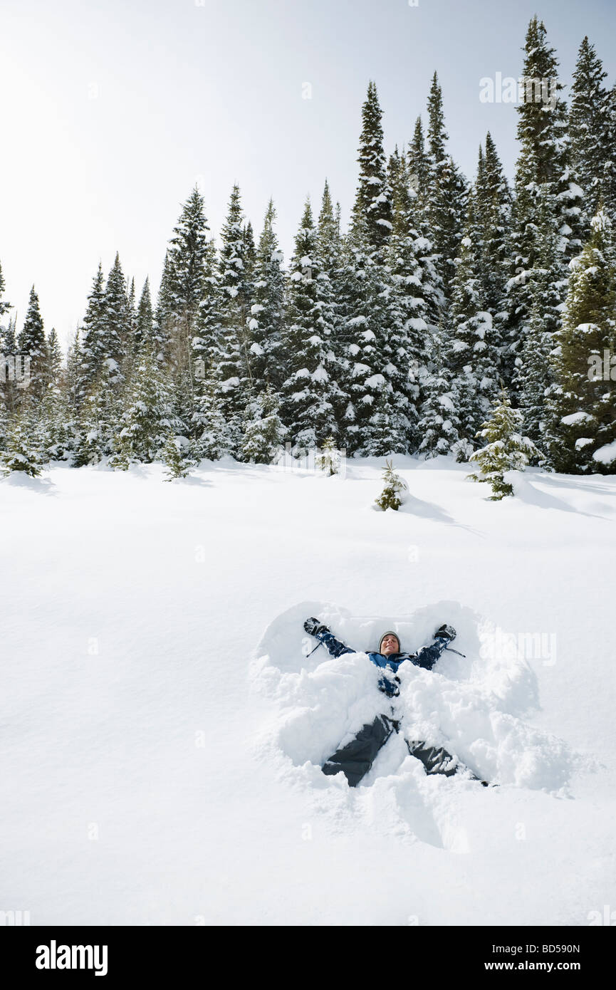 A person making snow angels Stock Photo - Alamy