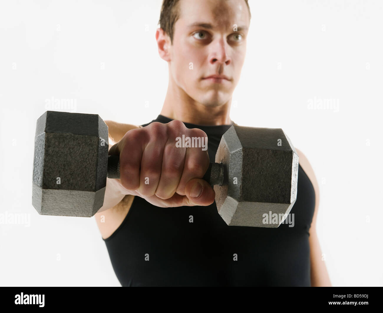 A man lifting weights Stock Photo - Alamy