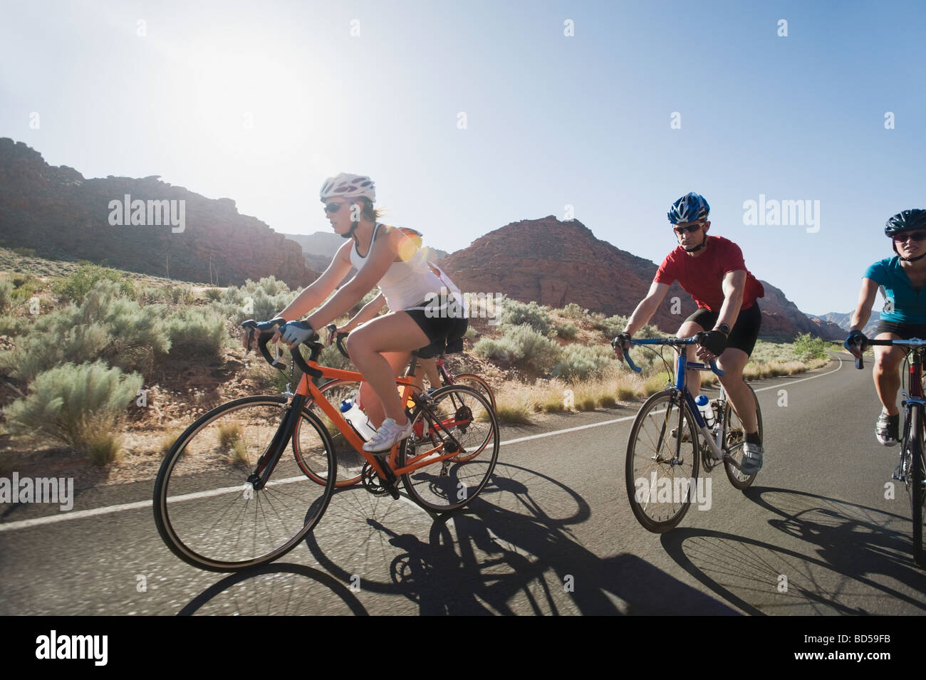 Group of bikers riding on mountain bikes hi-res stock photography and ...