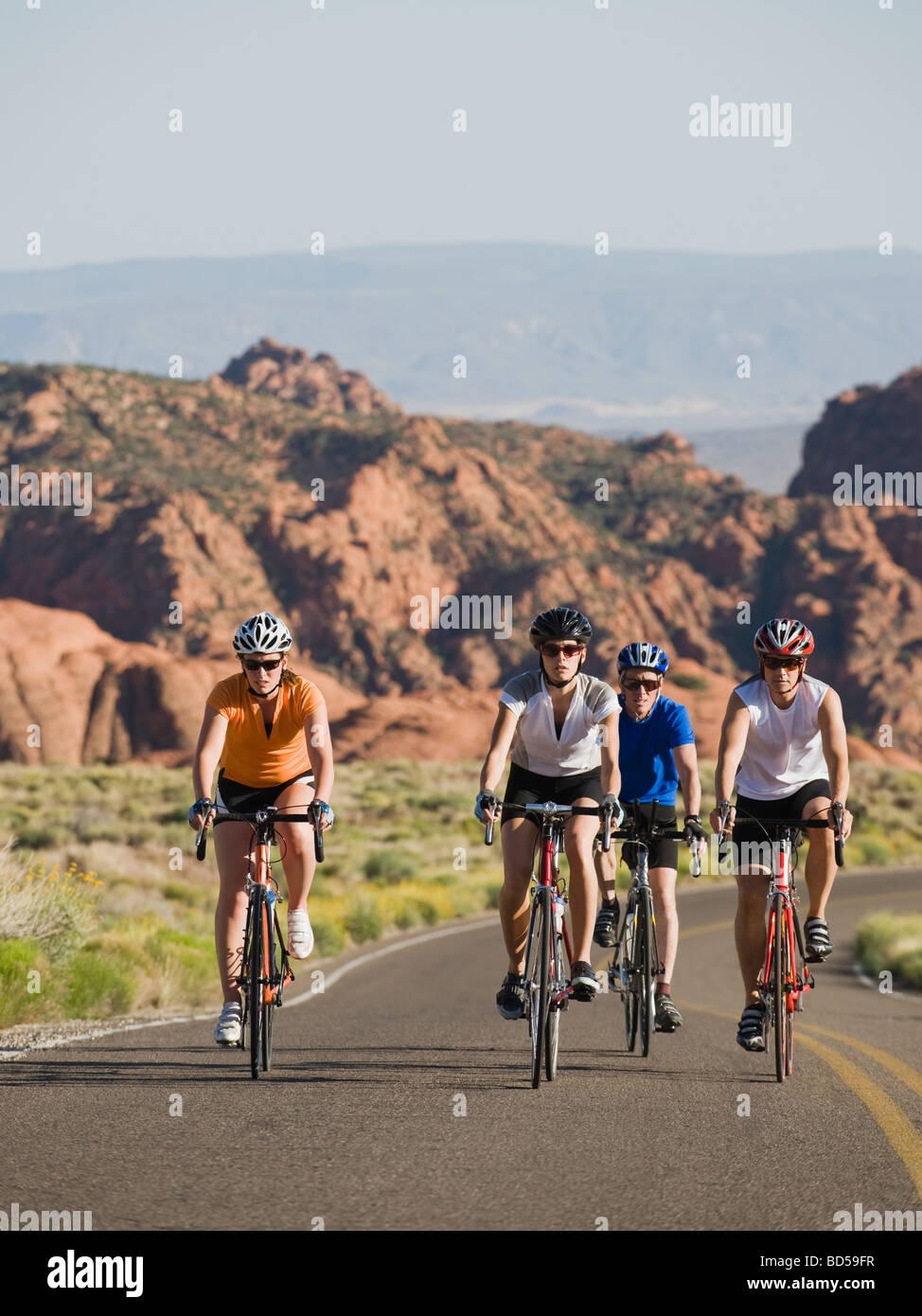 Group of bikers riding on mountain bikes hi-res stock photography and ...