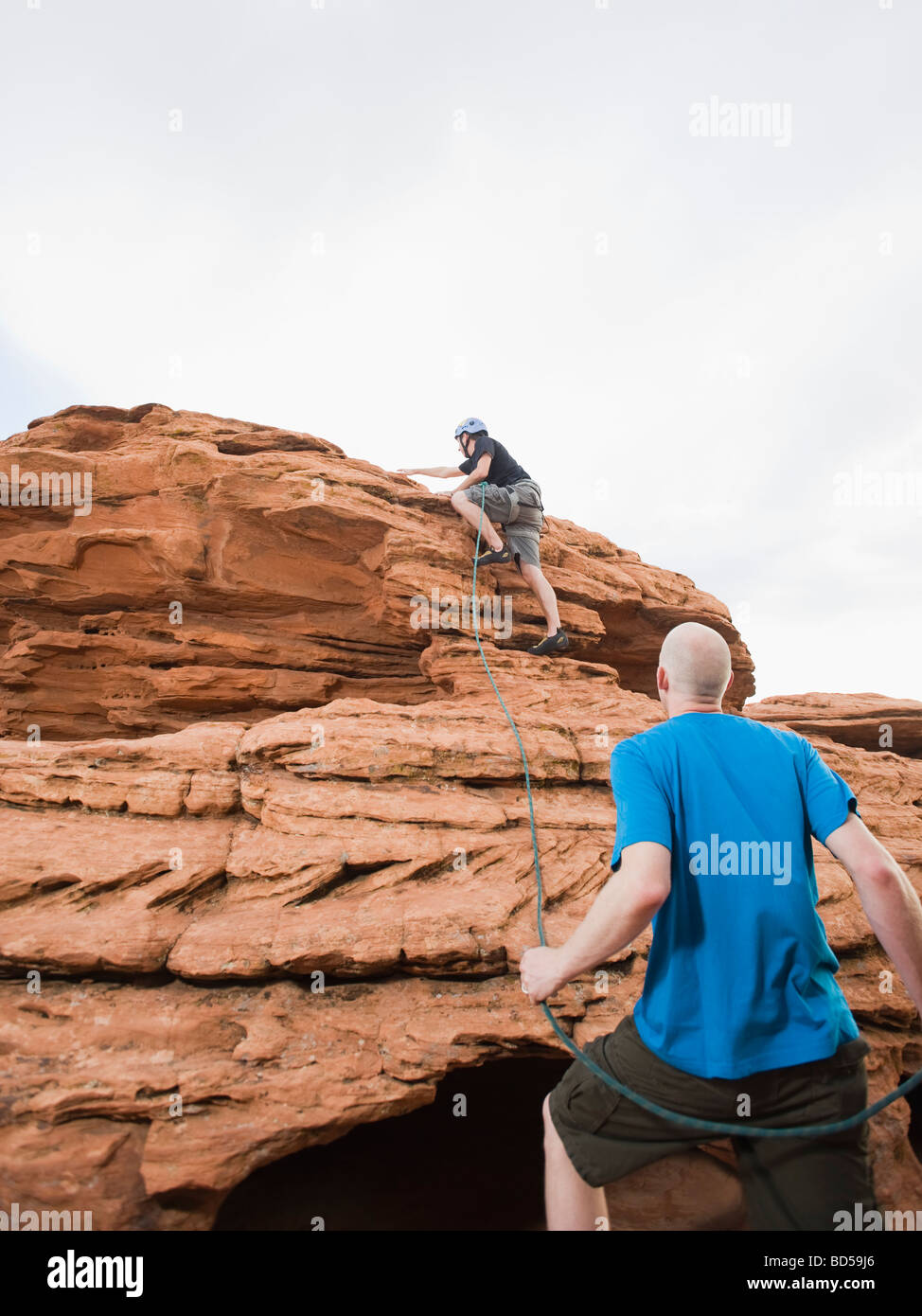Two people rock climbing red hi-res stock photography and images - Alamy