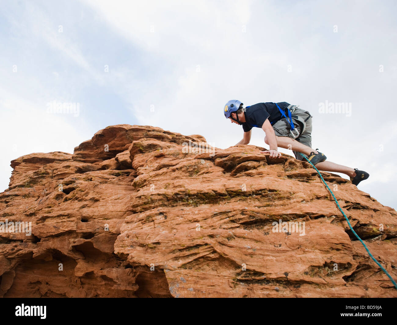 Man rock climbing red rocks hi-res stock photography and images - Alamy