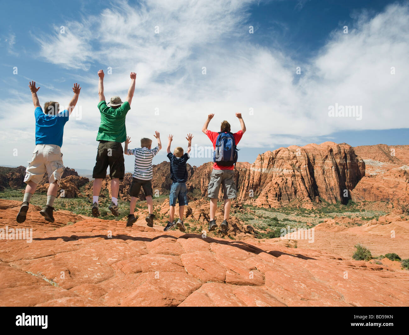 Children jumping of rock hi-res stock photography and images - Alamy